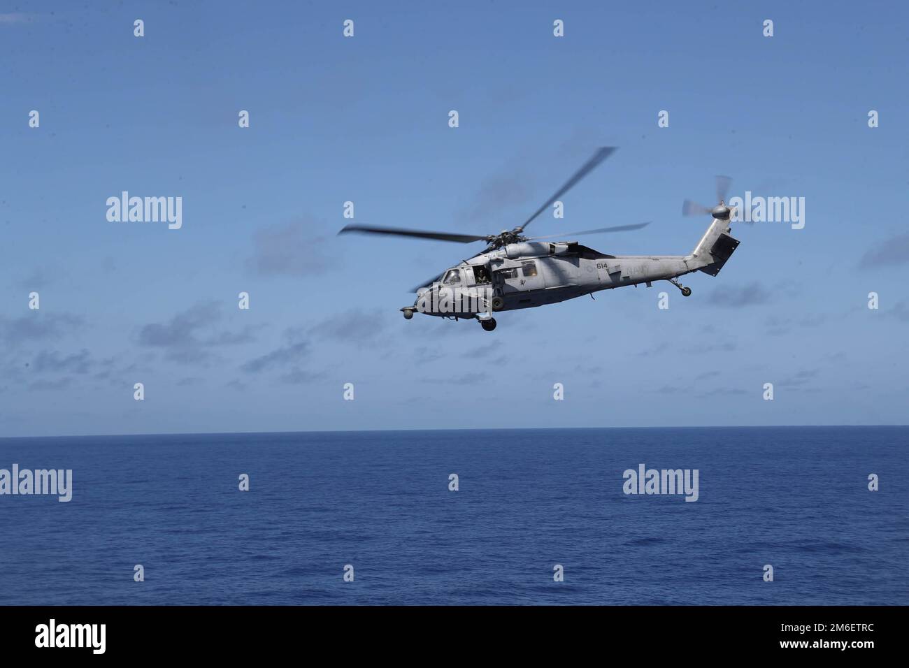 PHILIPPINE SEA (April 26, 2022) An MH60-R Sea Hawk helicopter, assigned ...