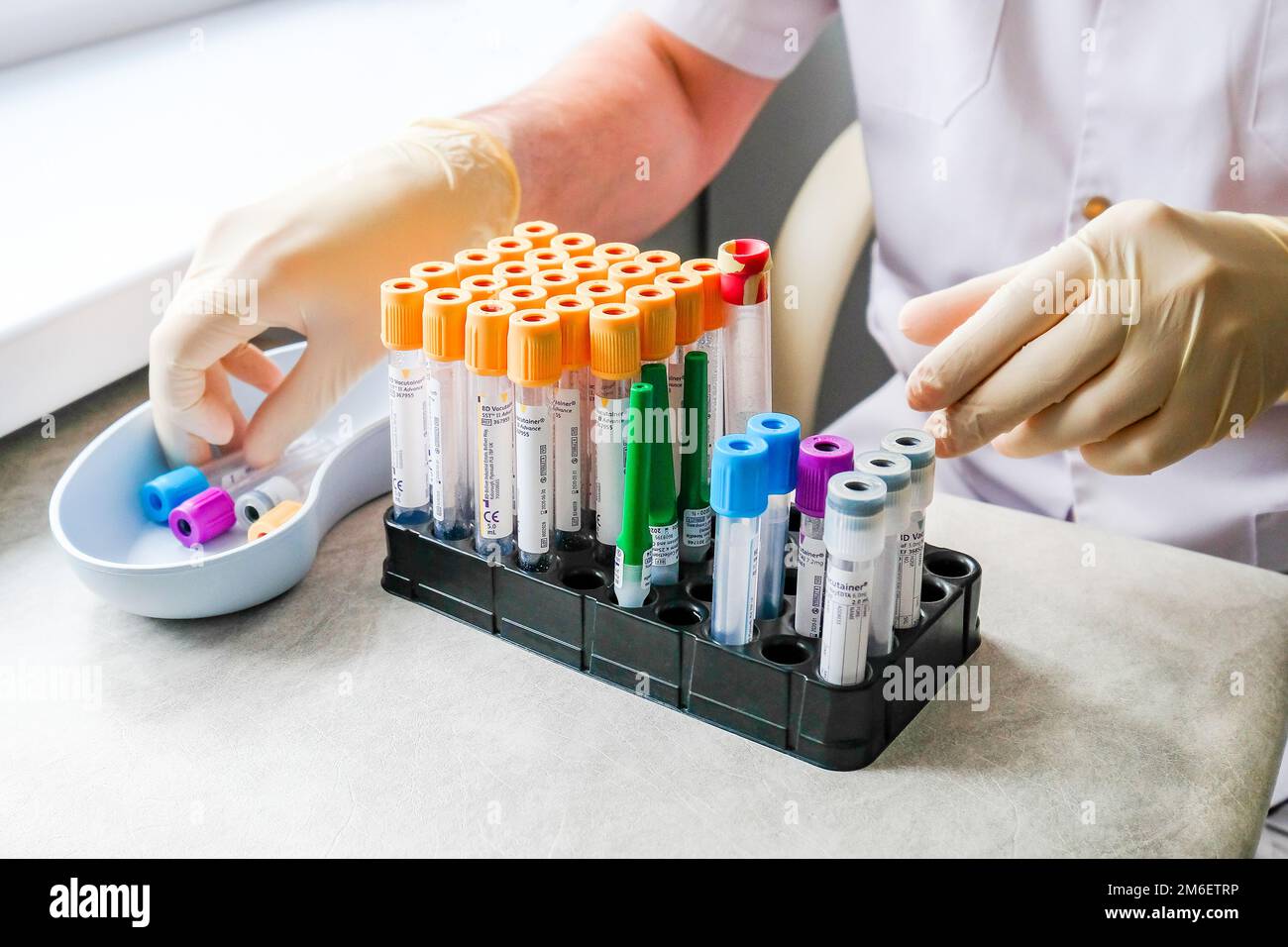 Medical test tubes in a stand. Nurse work with tools Stock Photo - Alamy