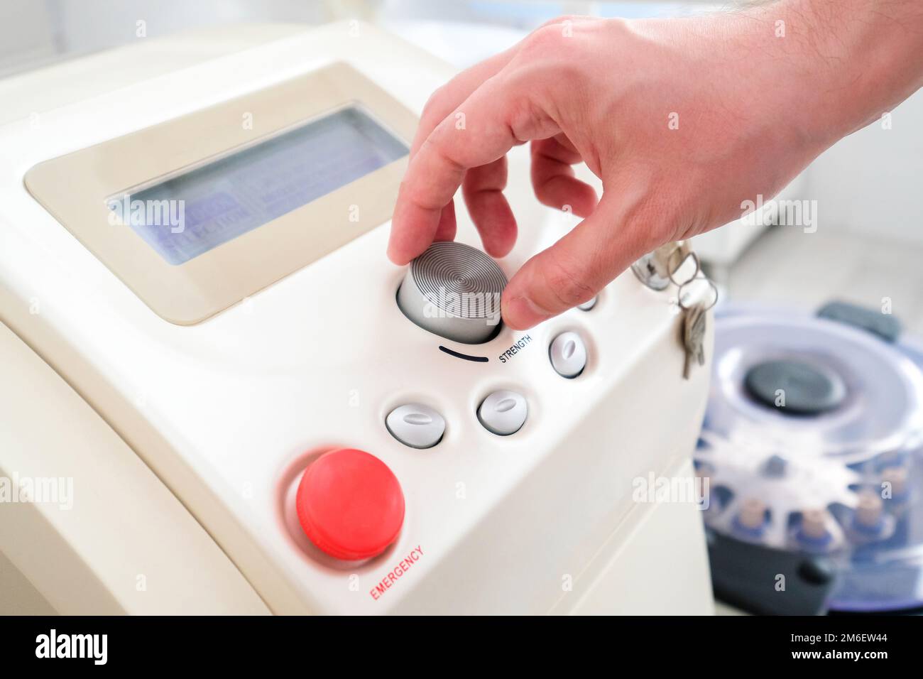 Medical equipment. Remote Control. Man controls the process Stock Photo ...