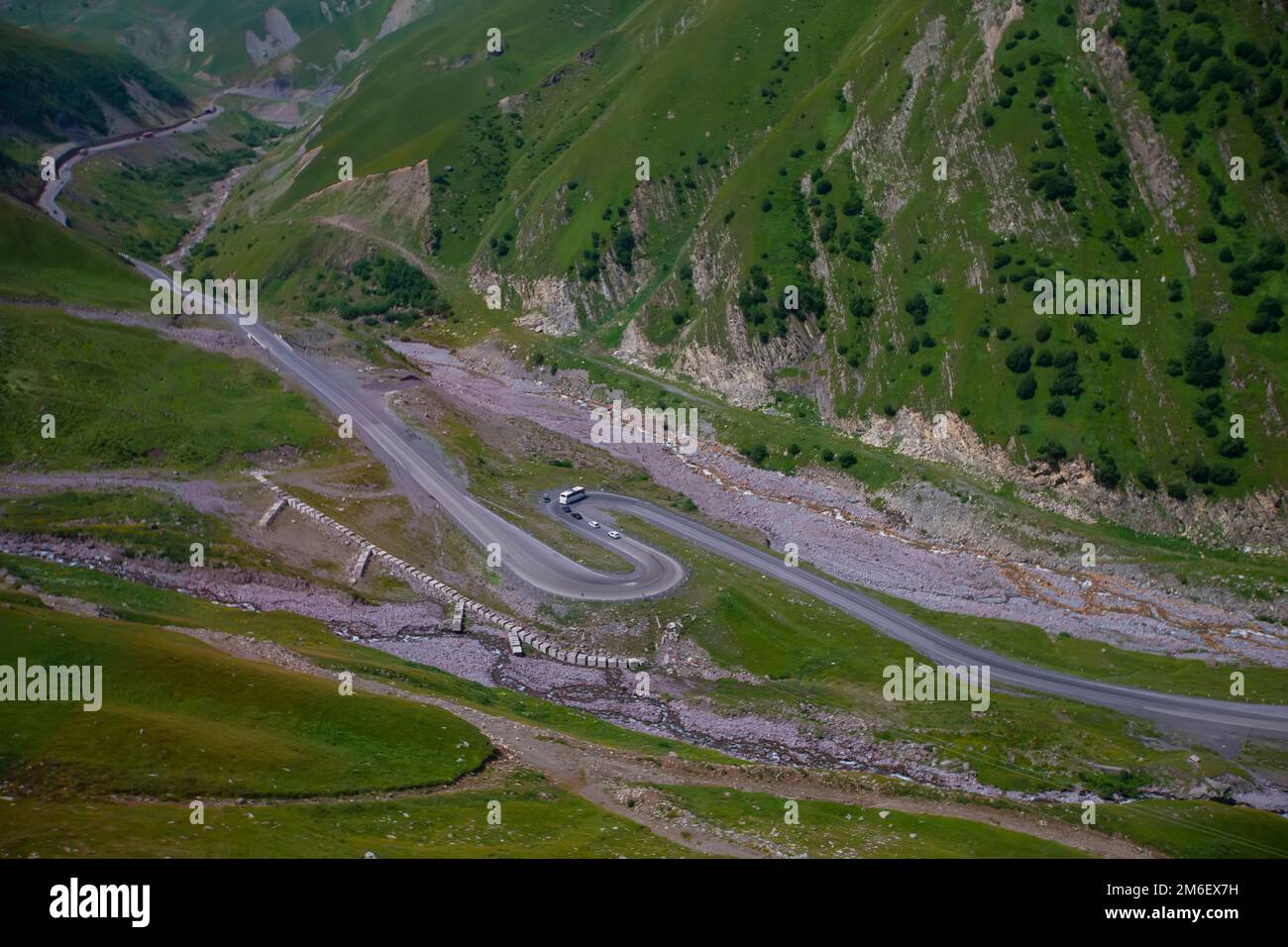 Mountain landscape with asphalt road top view Stock Photo - Alamy