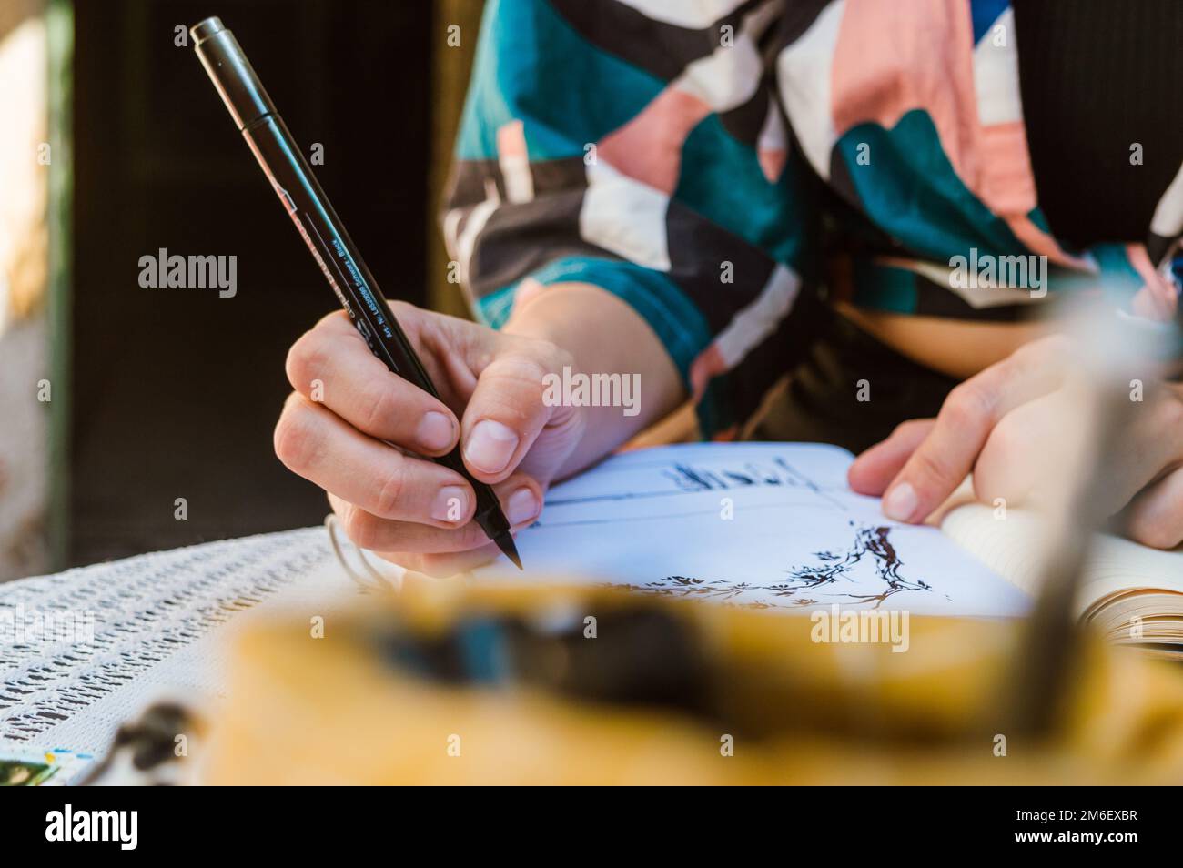 detail unrecognizable caucasian woman on terrace of her house by day ...