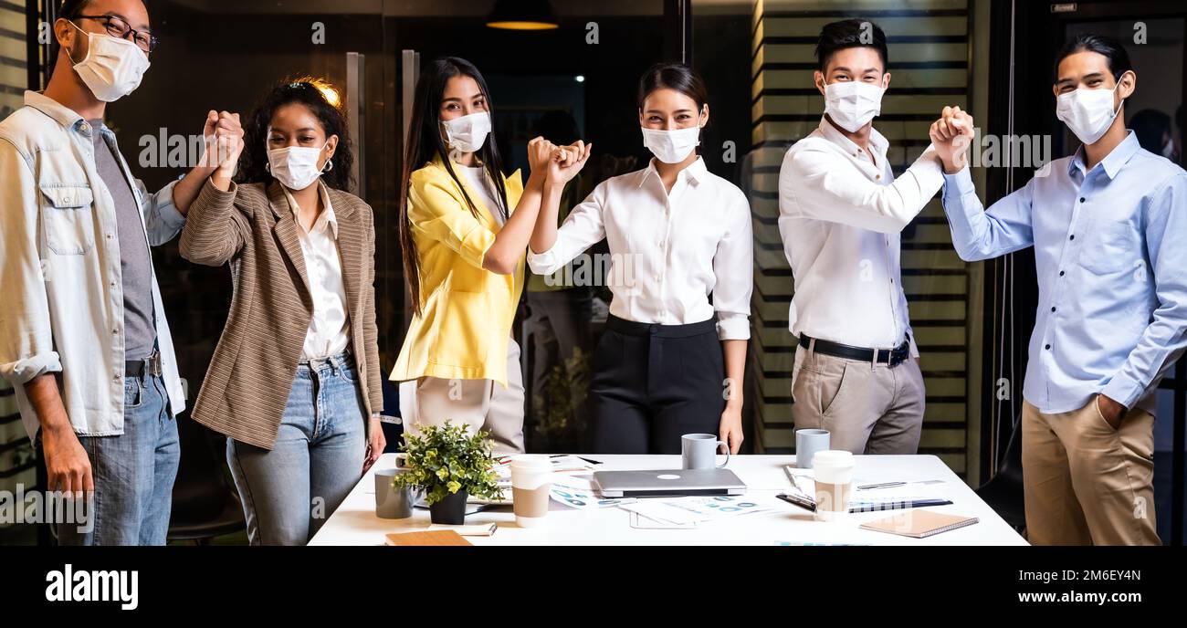 Panorama Office worker wear face mask in meeting room alternative ...