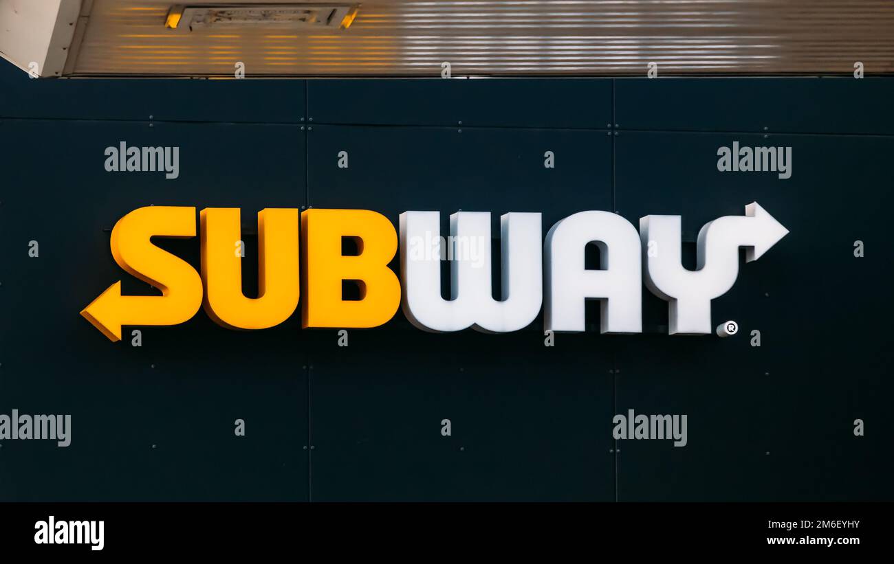 Logo Sign Brand of Subway On Wall Of Fast Food Restaurant Stock Photo ...