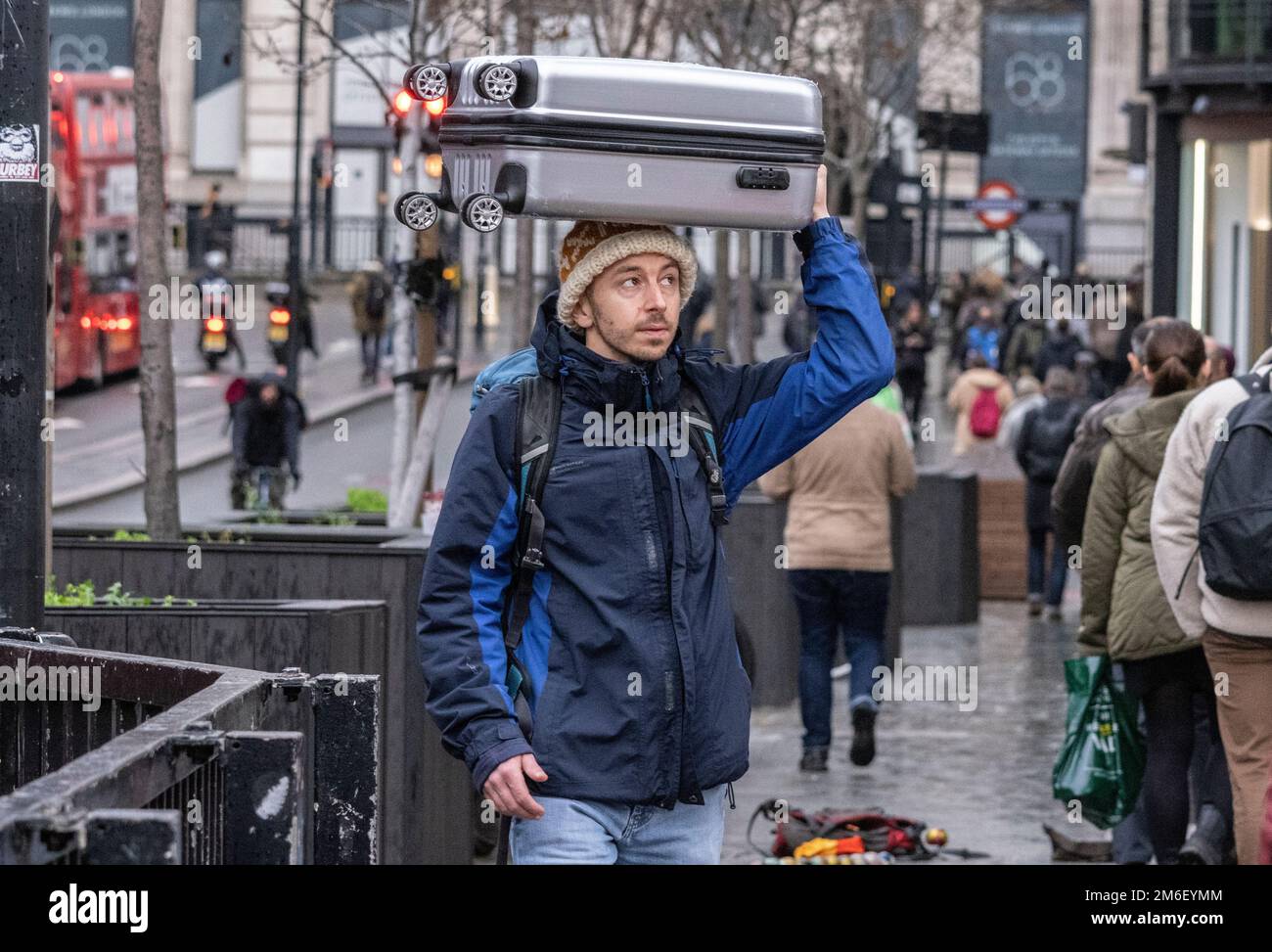 Man with suitcase hi-res stock photography and images - Alamy