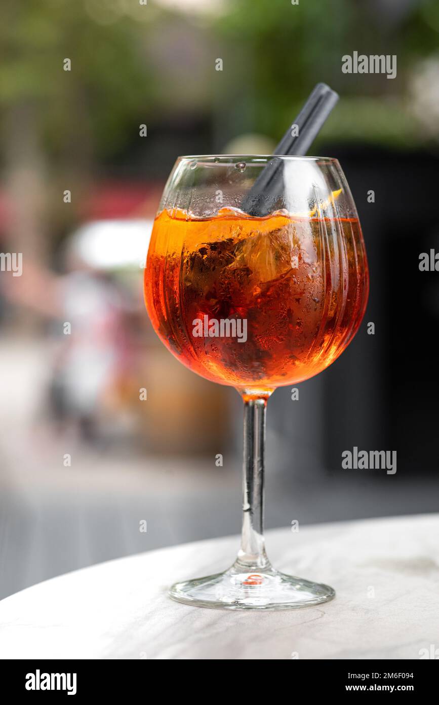 Classic cocktail Americano with campari, soda with ice.Traditional ...