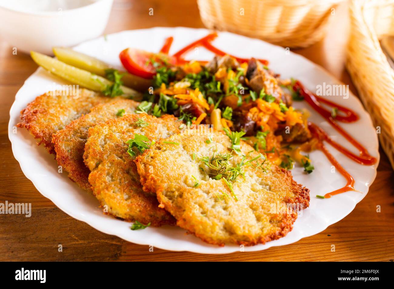 belarusian draniki with grilled beef dish in a restaurant Stock Photo ...