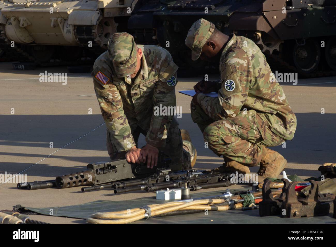 U.S. Army Staff Sgt. Donovan Leon, left, and Spc. Dante Gillyard ...