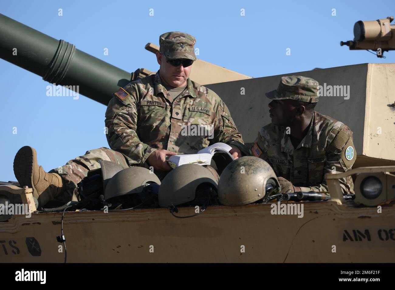 From left, U.S. Army Spc. Brandon Parton, tank loader, and Spc. Dante ...