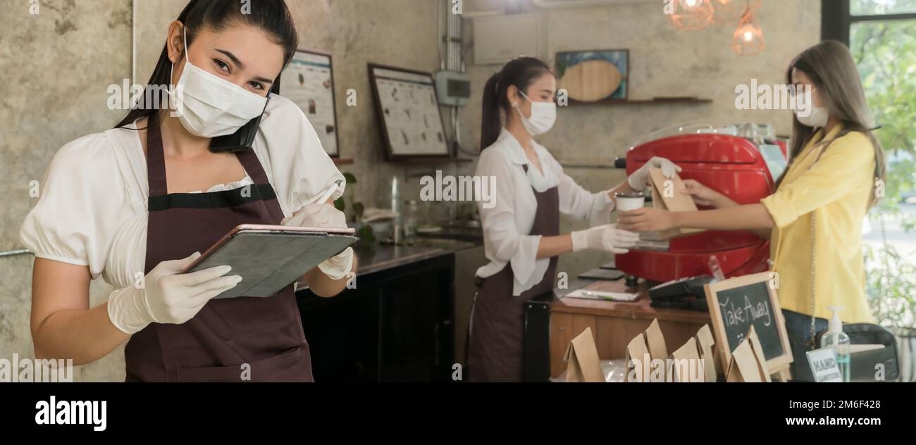 Panorama Waitress with face mask take order for curbside pick up and ...