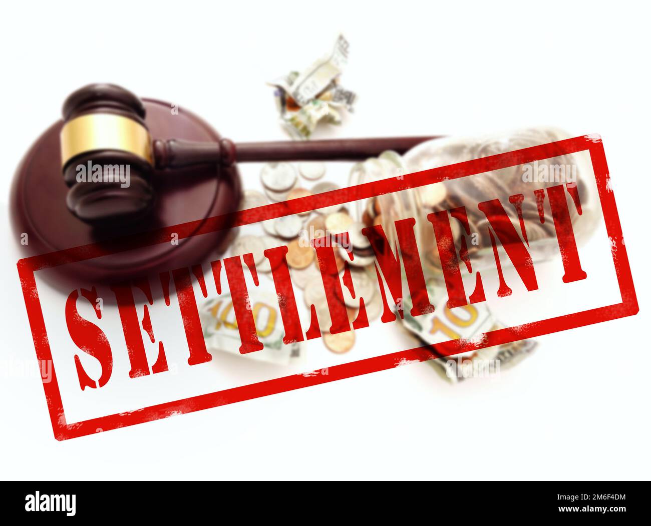 Red settlement stamp over legal gavel with hundred dollar bills and ...