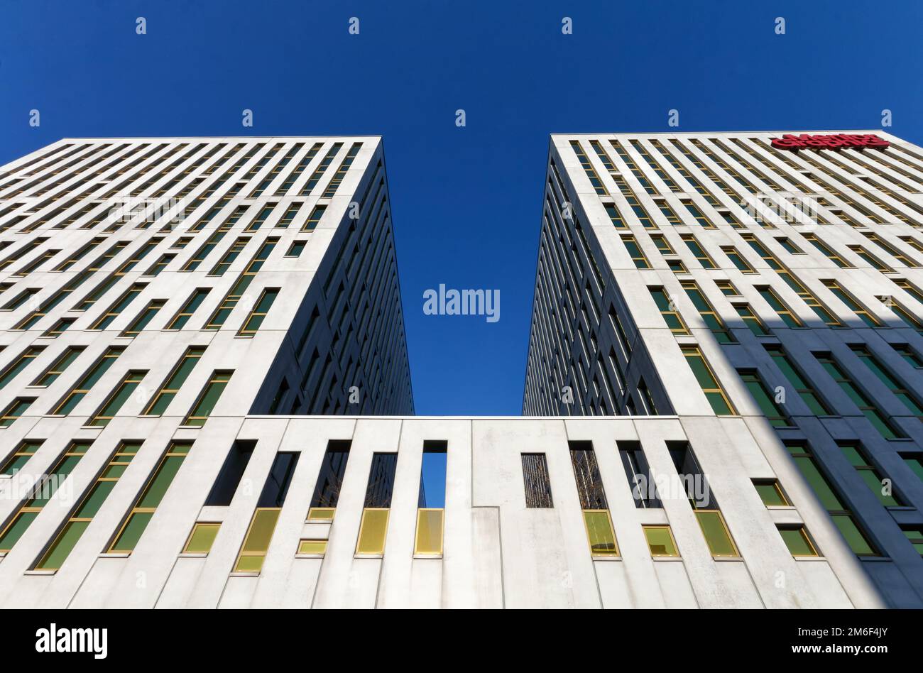 Silesia Star office complex with slit windows cut in concrete and ...
