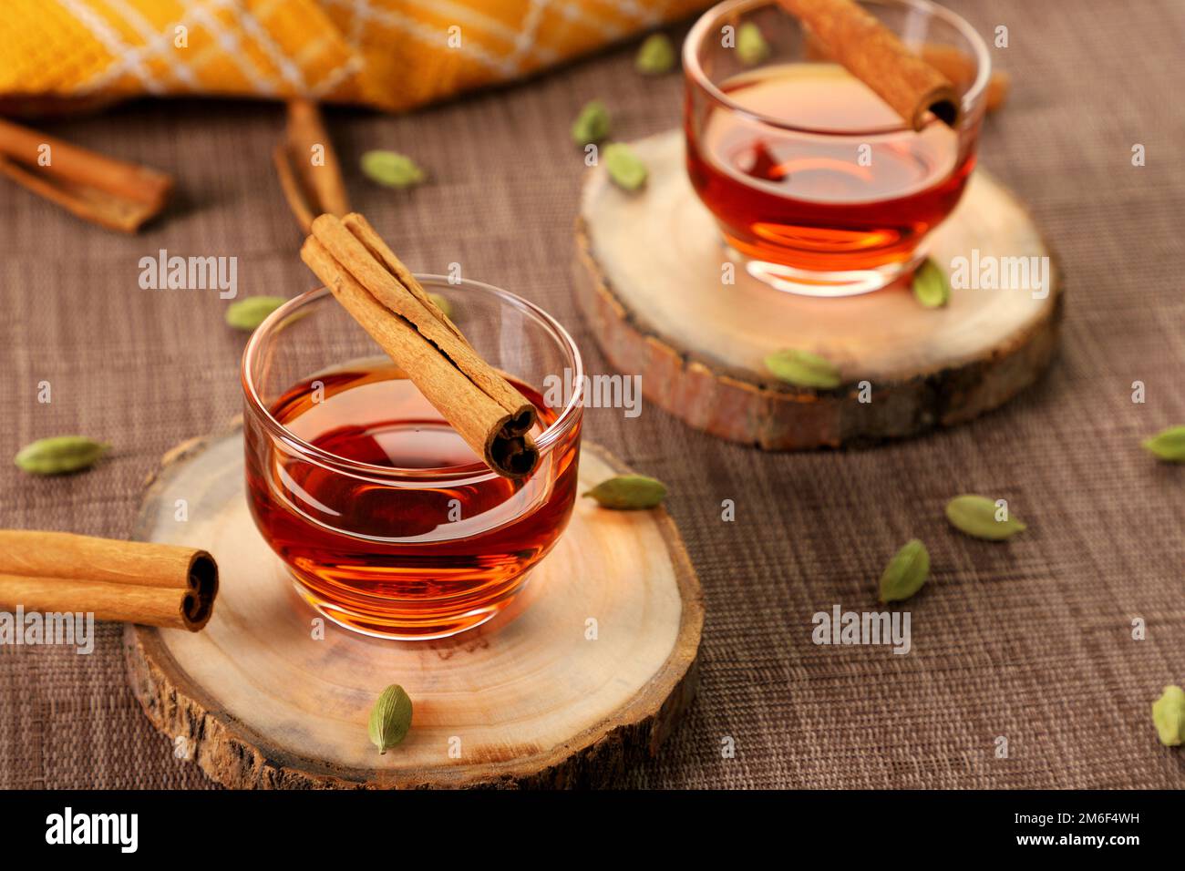 Healthy Green / Black Tea with Cardamom and Cinnamon Stock Photo - Alamy
