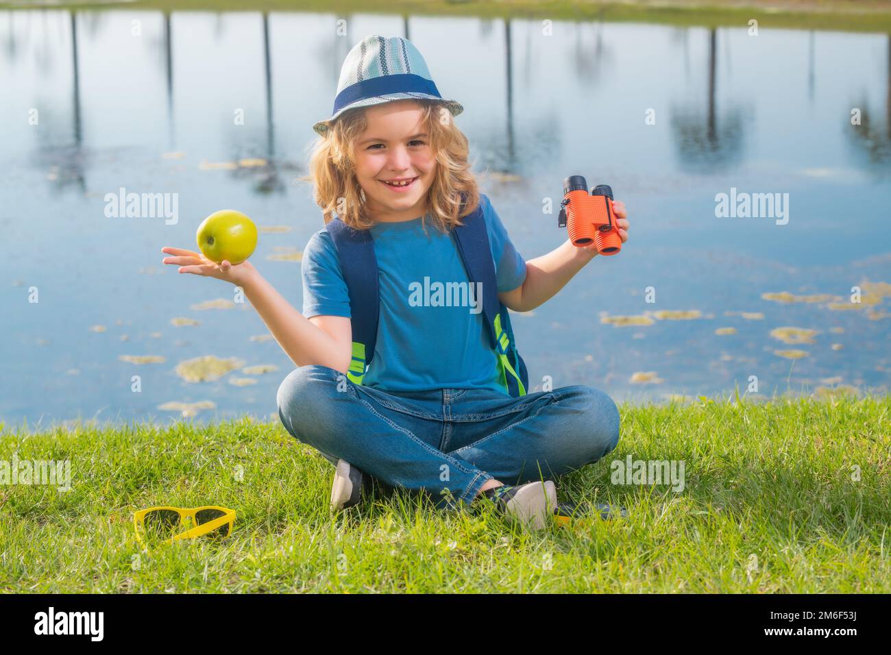 Travel and adventure concept. Little child boy tourist explorer with ...