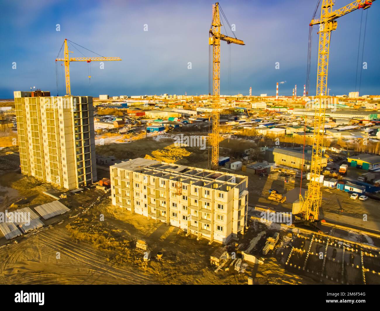 Construction of new residential buildings. Tower cranes at construction ...