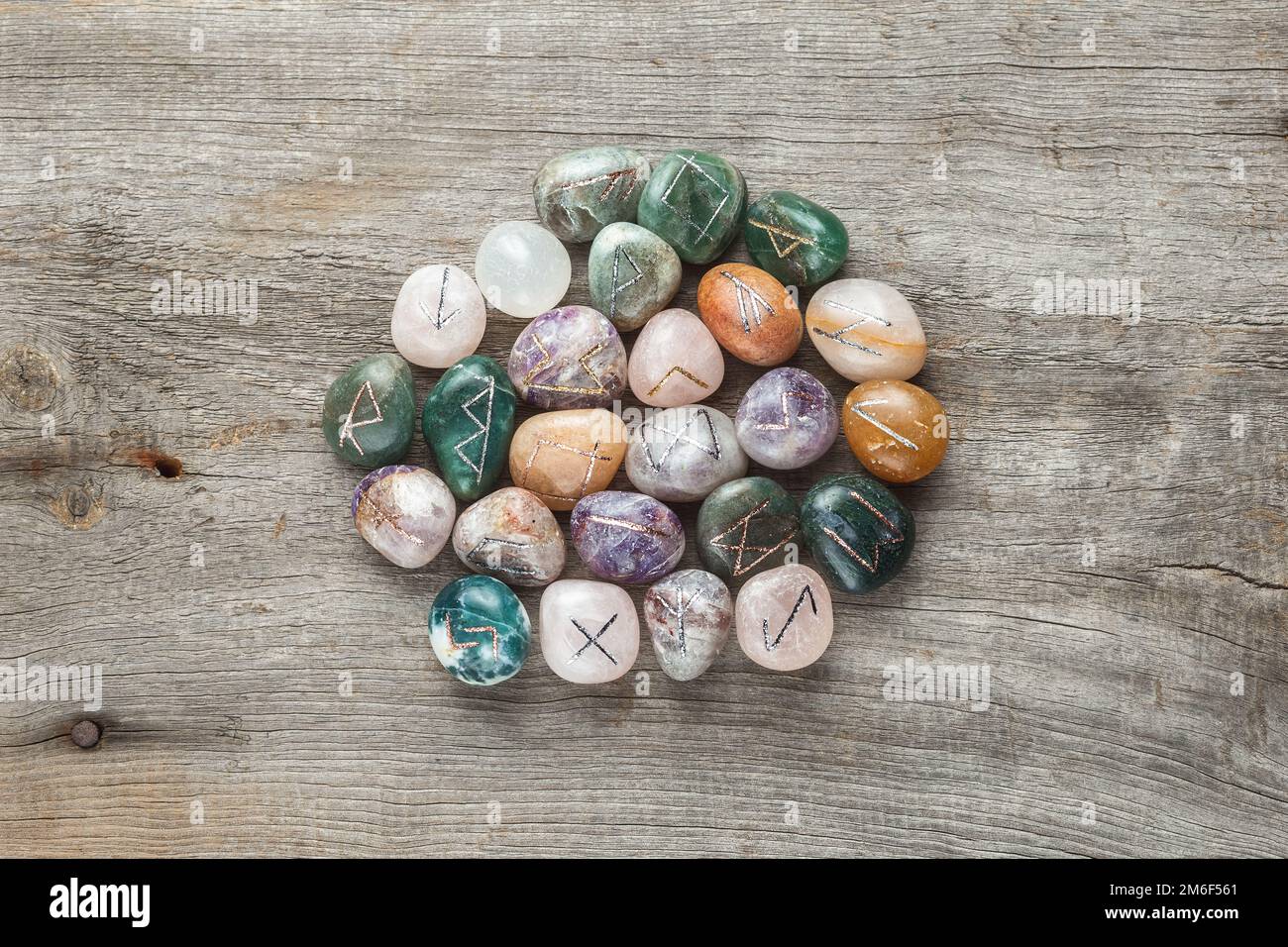 Elder Futhark Rune Stones Set Made of Natural Gemstones on Wooden ...