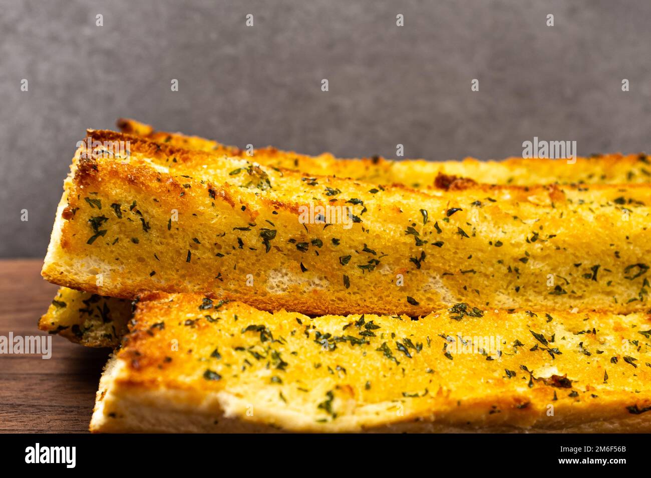 Garlic Baguette Sticks with Garlic, Butter and Herbs Stock Photo - Alamy