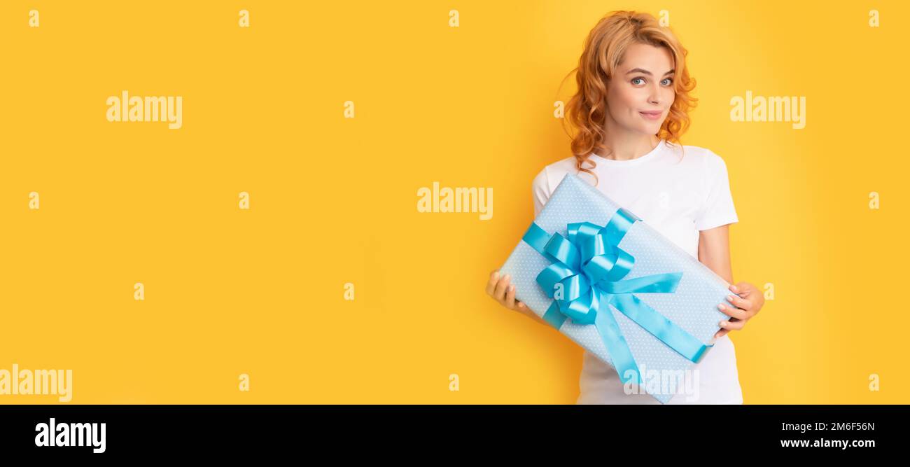 positive redhead lady with giftbox. mothers day. Beauty woman isolated ...