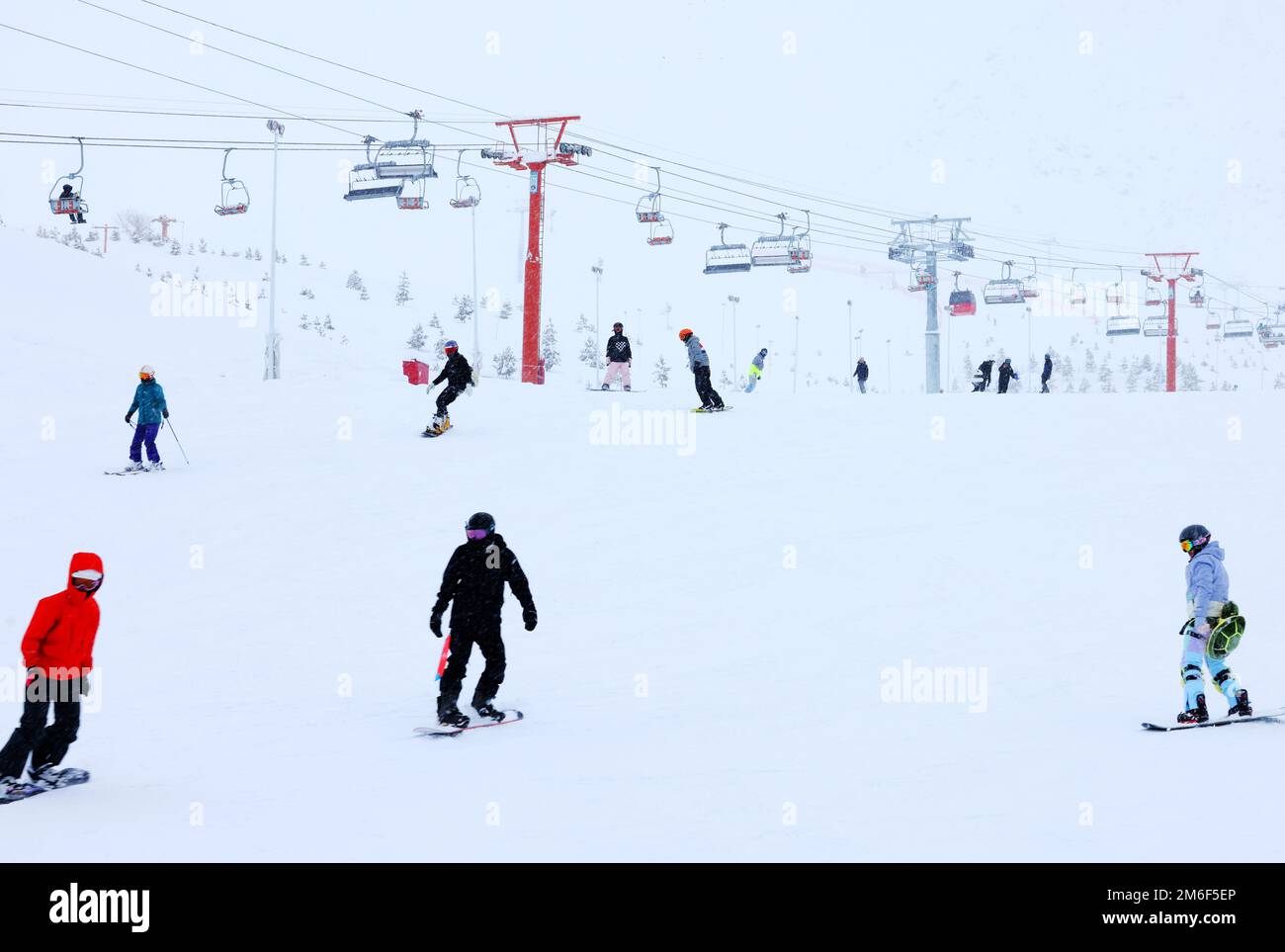 ALTAY, CHINA - JANUARY 4, 2023 - Tourists ski at the Jiangjun Mountain ...