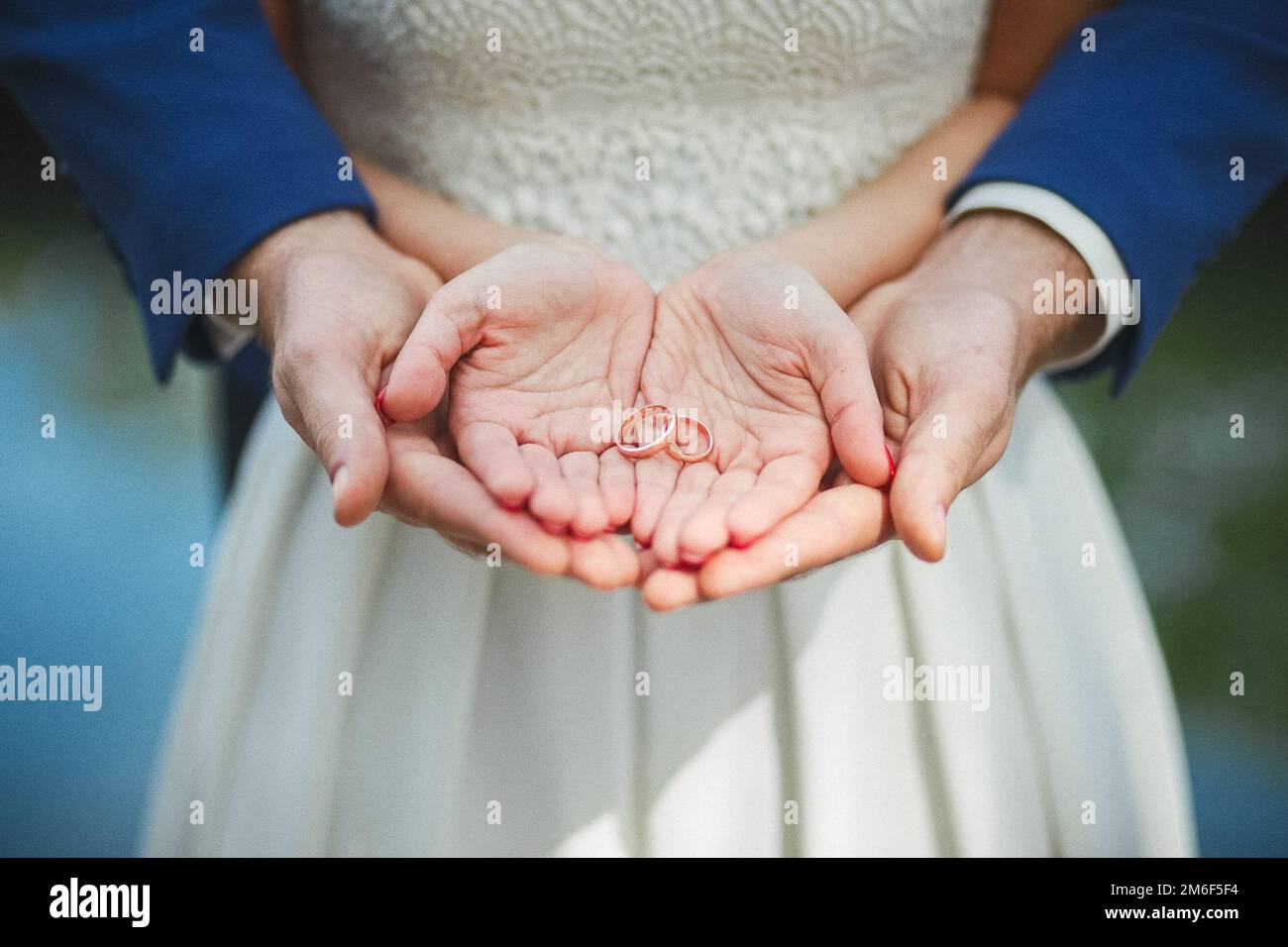 Hand showing wedding engagement rings hi-res stock photography and ...