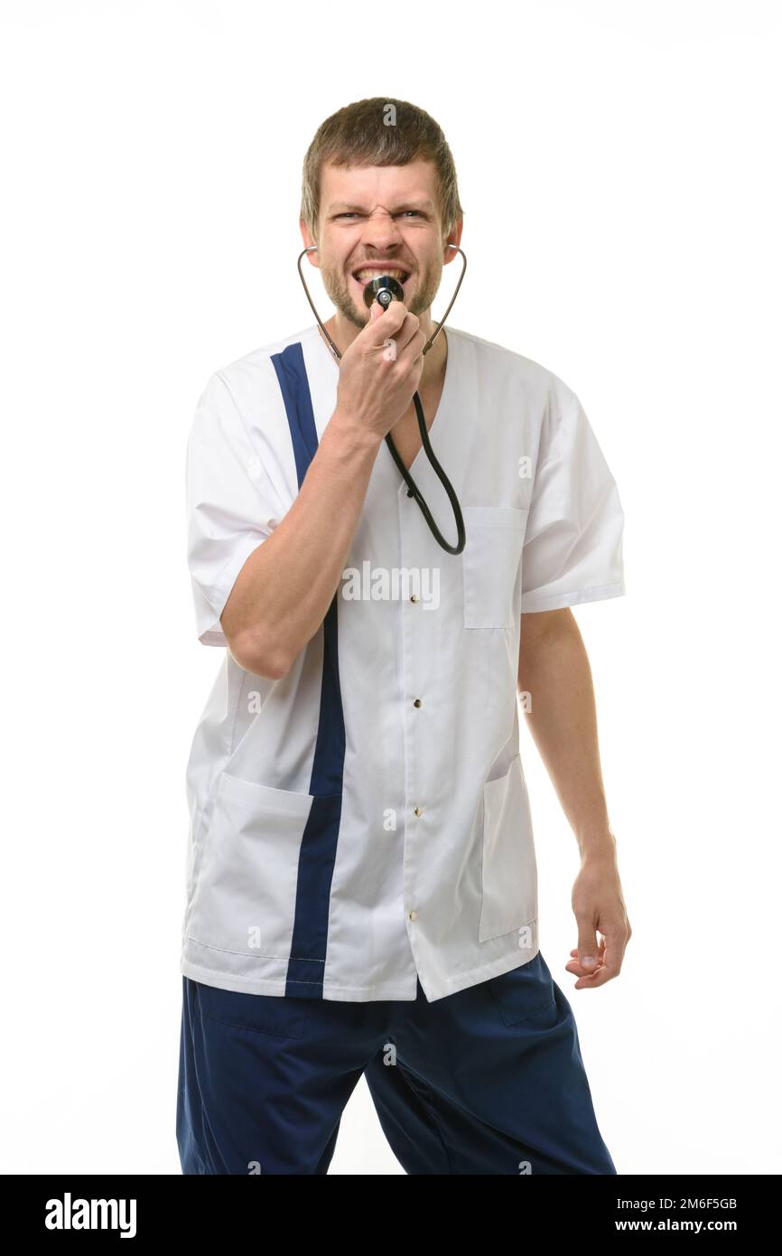 Irritated doctor yelling into phonendoscope head and looking into frame ...