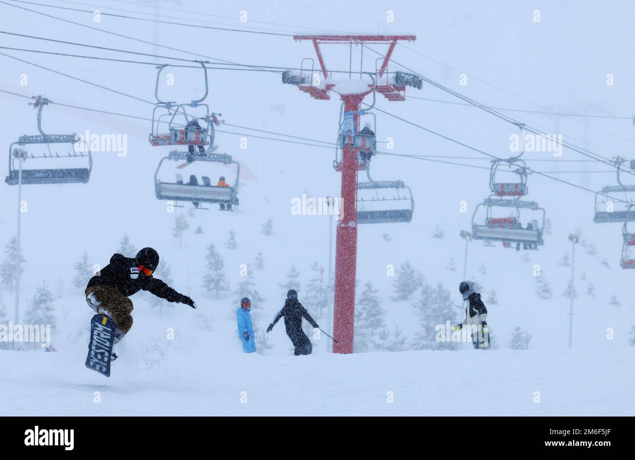 ALTAY, CHINA - JANUARY 4, 2023 - Tourists ski at the Jiangjun Mountain ...
