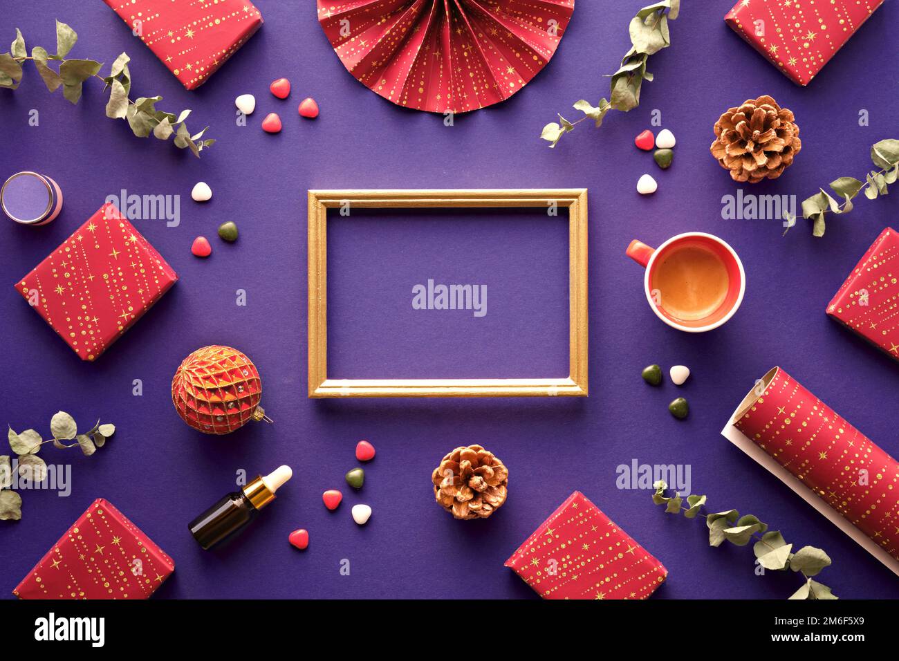 Christmas gift boxes, flat lay in purple and red colors. Wellness ...