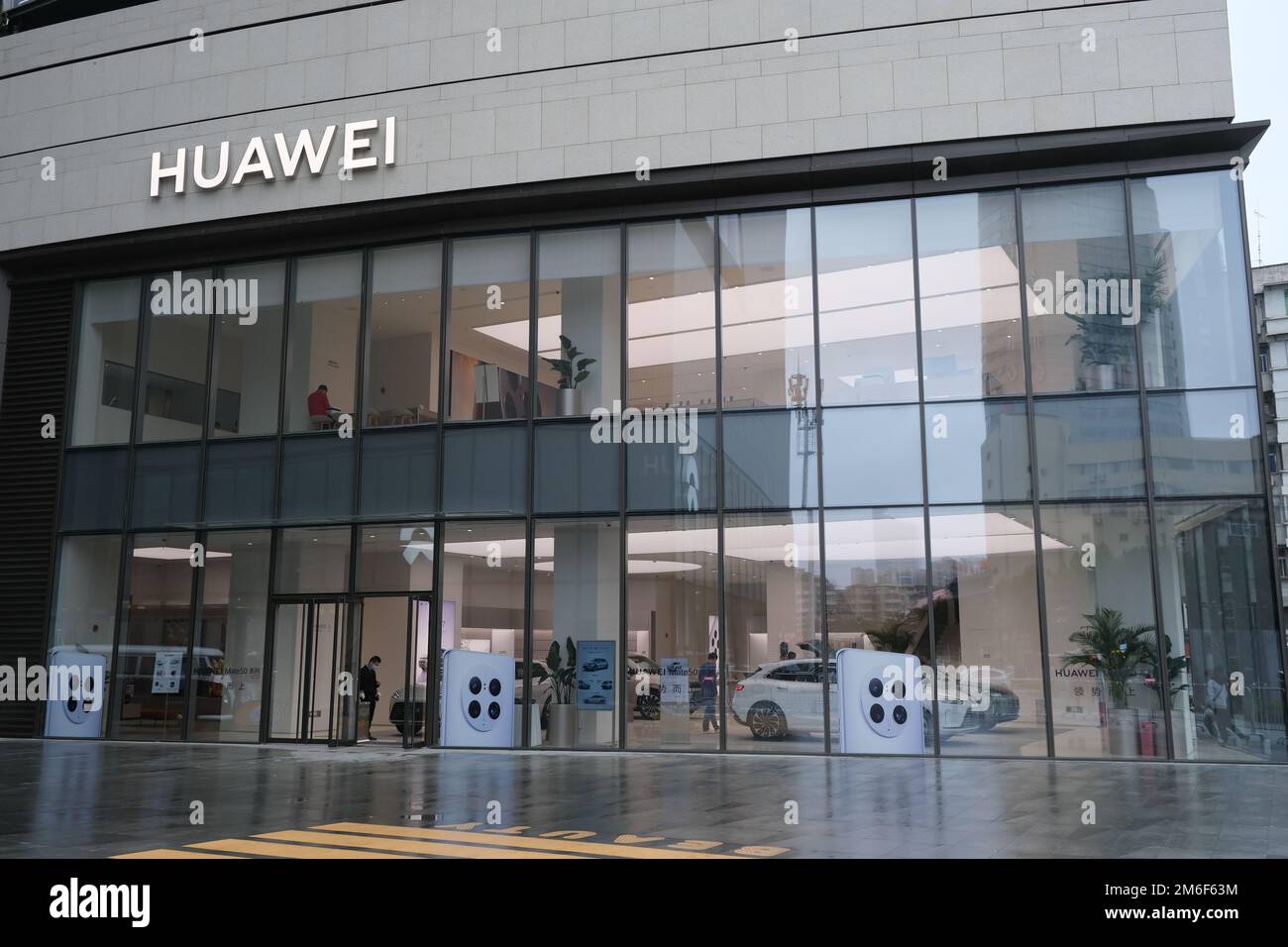 Wuhan, China-Oct.5th 2022: large HUAWEI retail store with electric car ...