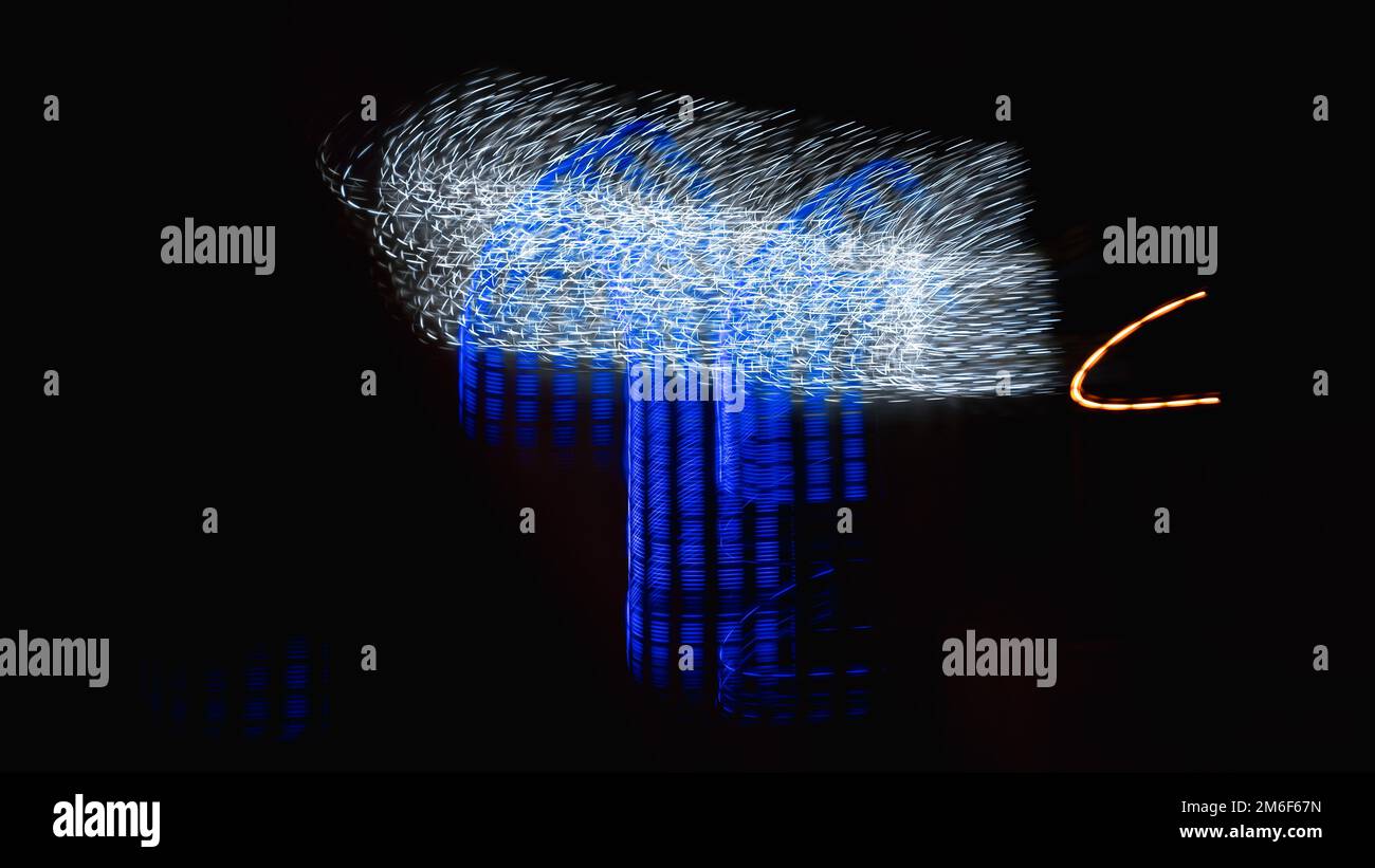 Beautiful colorful background.Long exposure light painting, curvy lines ...