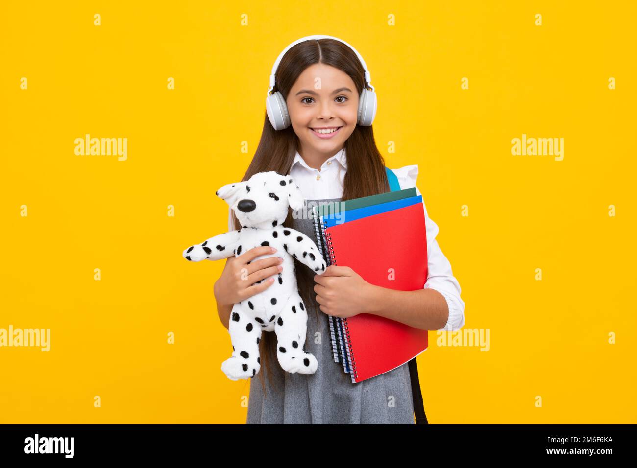 Back to school. Teenager schoolgirl hold toy. School children with ...