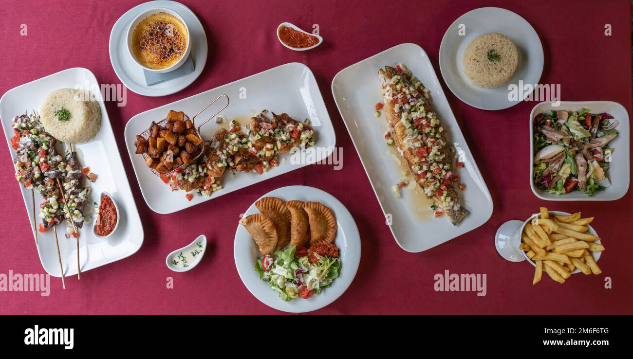 African culinary Still Life. Mix of African dishes top view Stock Photo ...