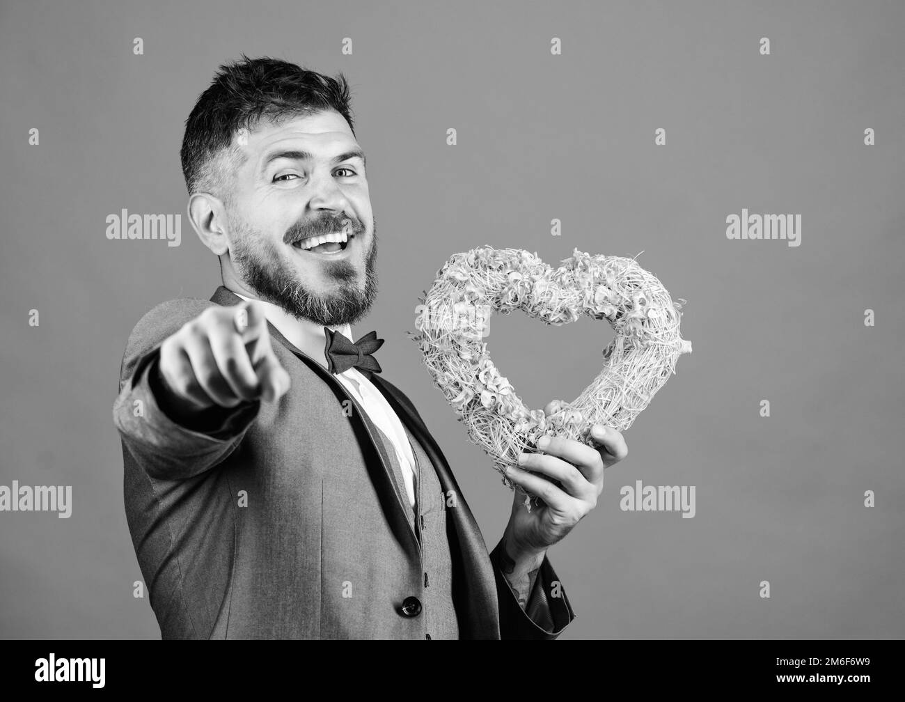 Hipster hold heart symbol love. Romantic surprise. Man formal suit ...