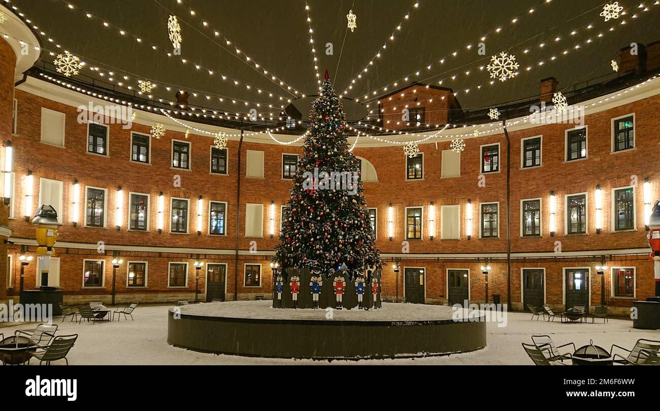 Winter snowy morning and New Year's electrical decorations in the city ...
