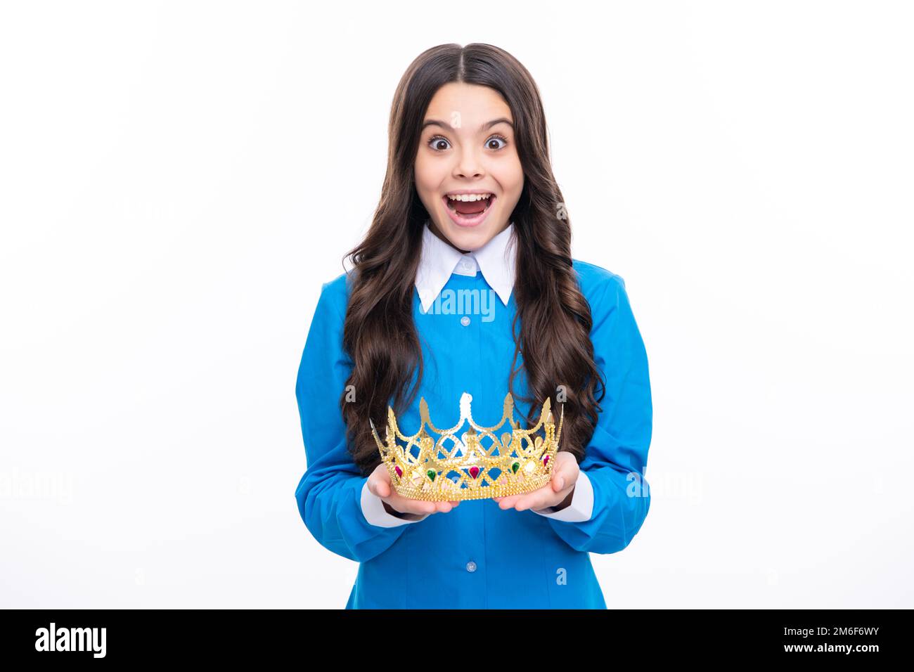 Excited face. Little queen wearing golden crown. Teenage girl princess ...