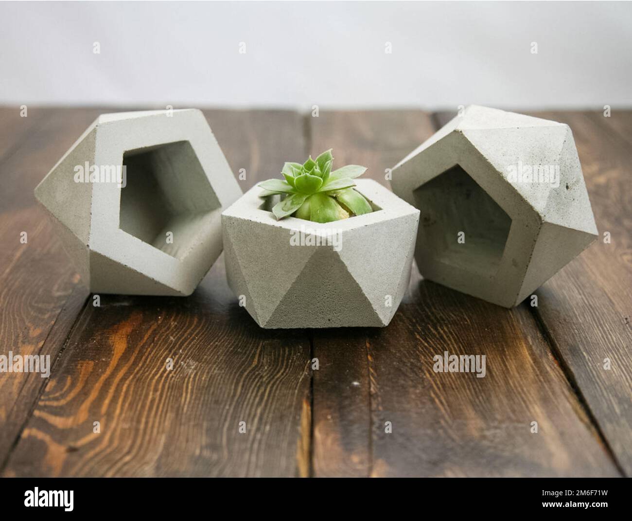 Hexagonal stone pot for flowers Stock Photo - Alamy