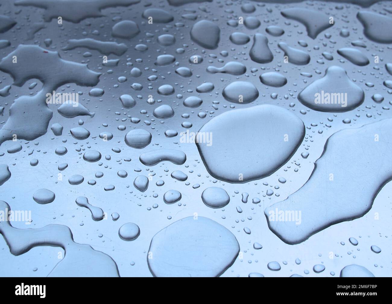 Water drops on a metal surface Stock Photo - Alamy