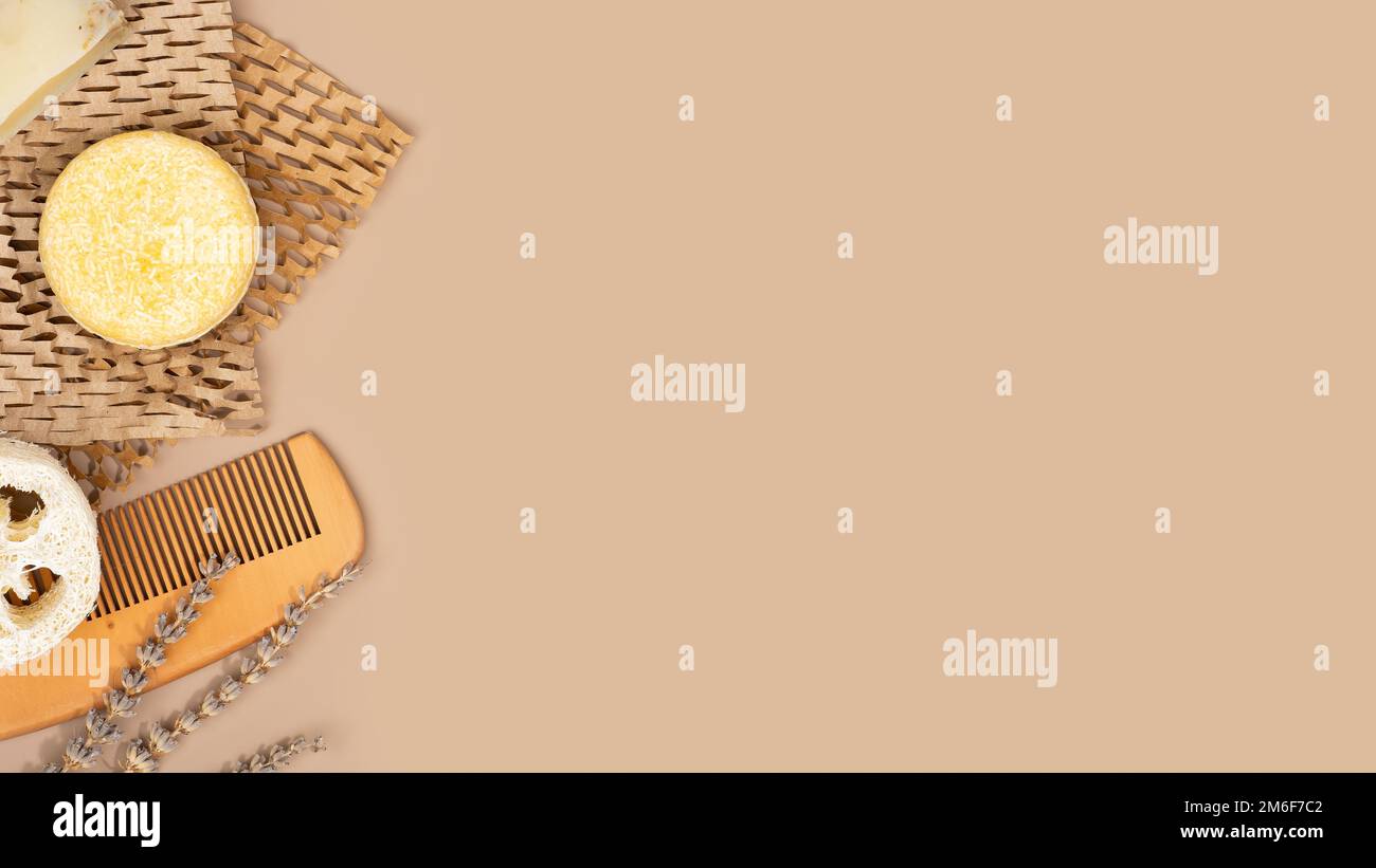 Eco solid shampoo bar and wooden comb laying on a Honeycomb Paper ...
