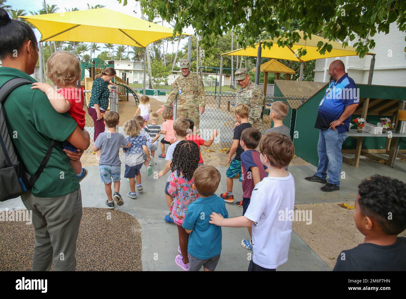 Children, parents and Child and Youth Services staff enter the new CDC ...