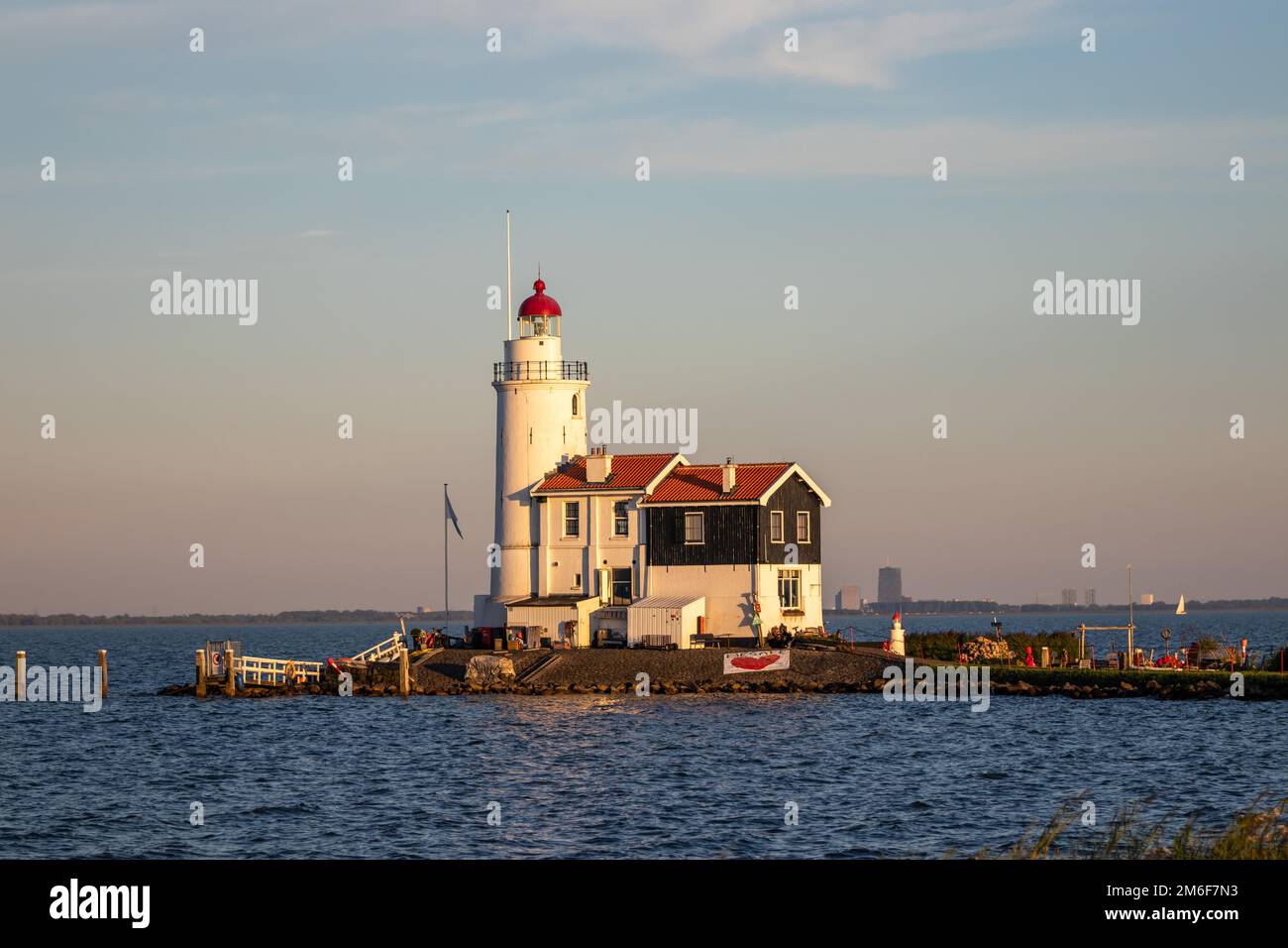 paard van marken lighthouse on marken island in golden hour with blue ...