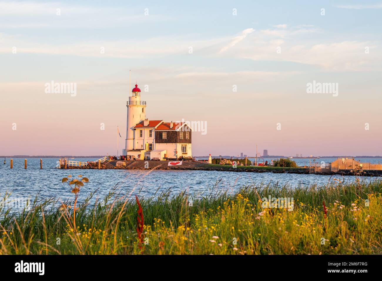 paard van marken lighthouse on marken island in golden hour with blue ...