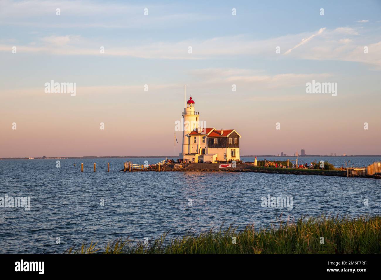 paard van marken lighthouse on marken island in golden hour with blue ...