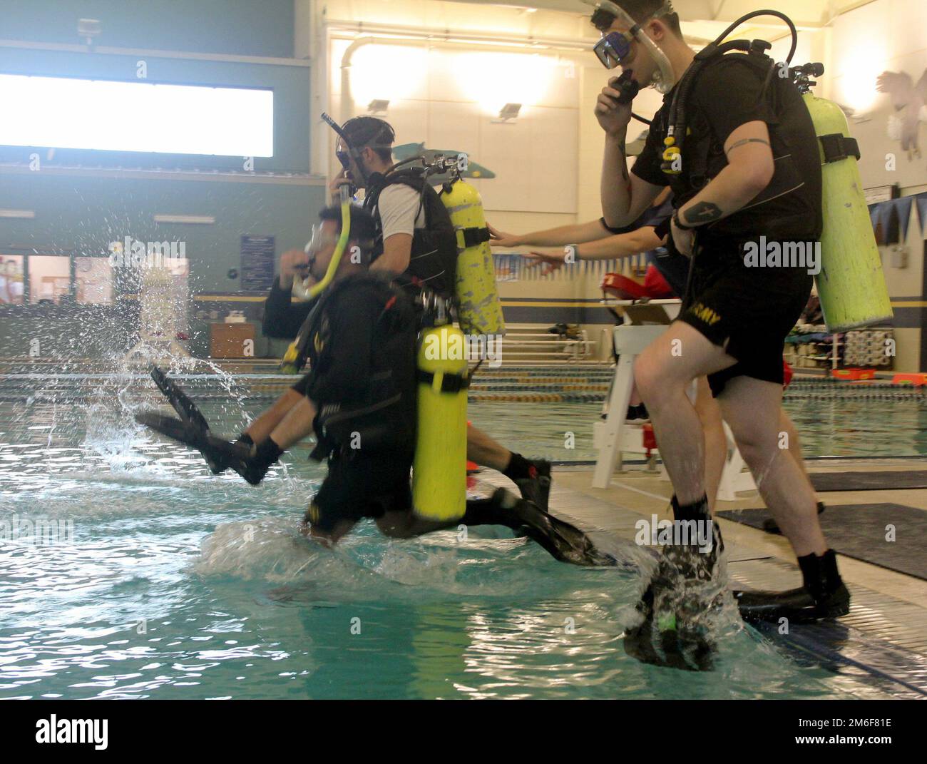 Group dive jump into pool hi-res stock photography and images - Alamy