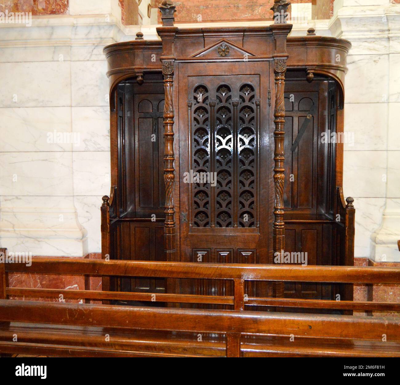 Wooden carved window of the confessional in the Church Stock Photo - Alamy