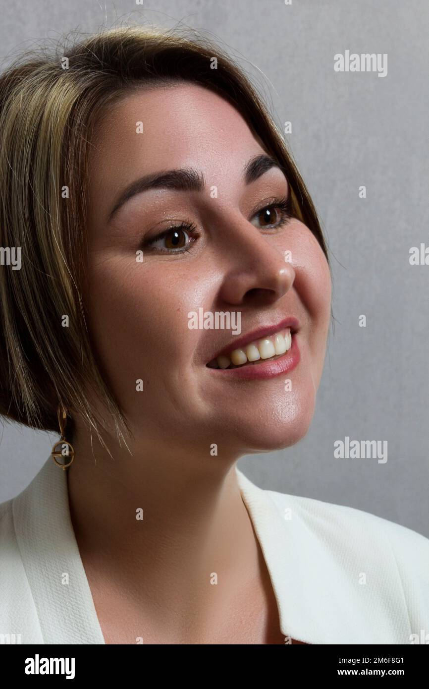 Young smiling woman Stock Photo - Alamy