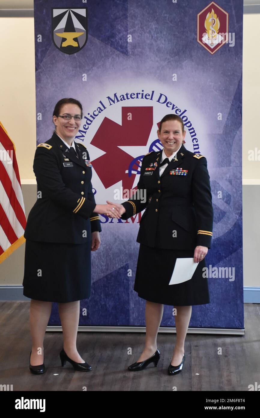 Col. Gina E. Adam, former USAMMDA commander, recognized Lt. Col. Sandi ...
