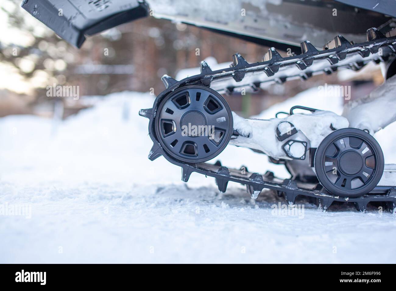 Rear suspension of a snowmobile in winter. Riding in the snow Stock ...