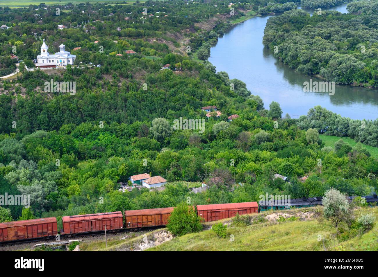 Freight train travels by rail near the Naslavcha village, Moldova Stock ...
