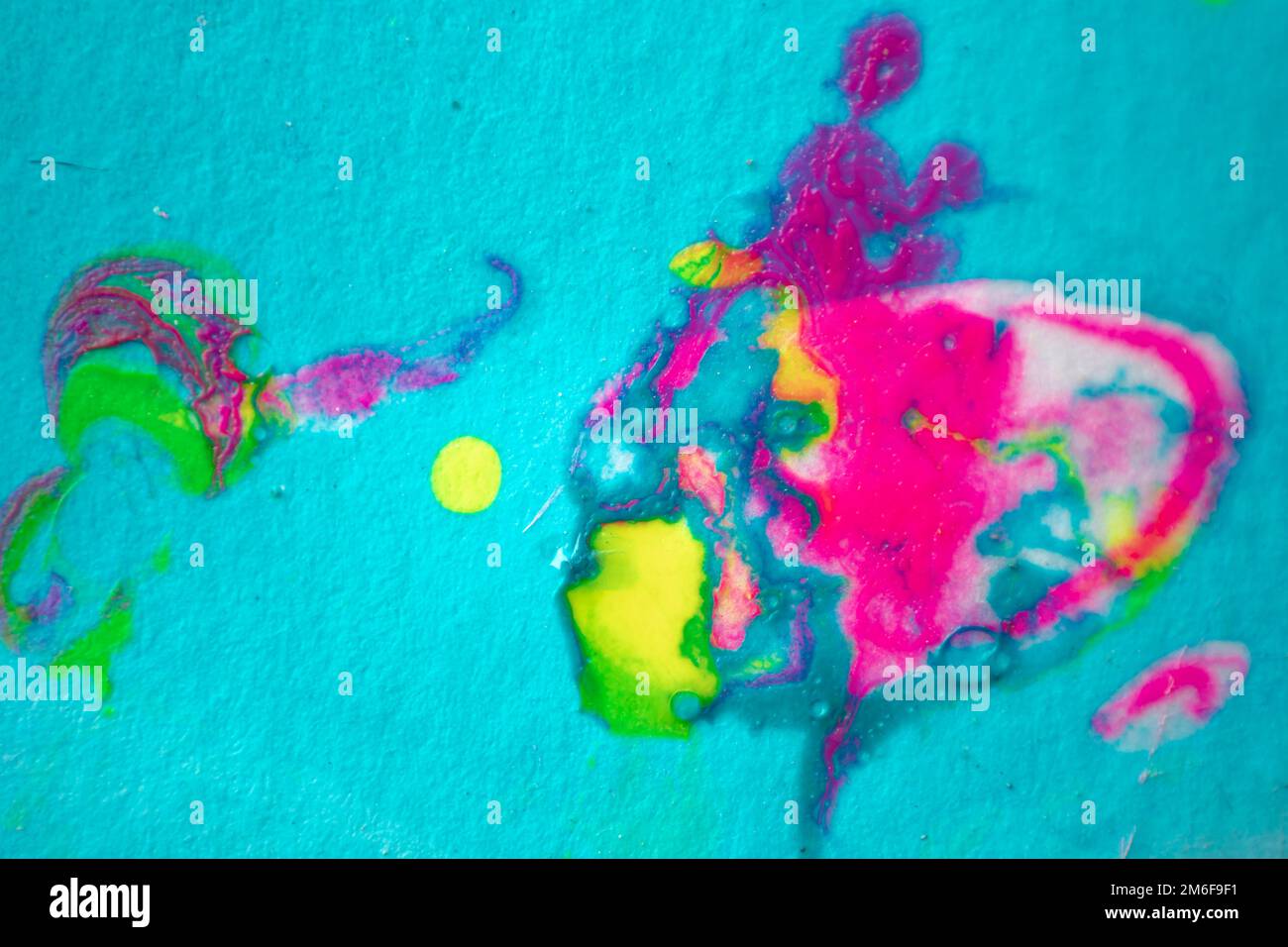 Texture created with paints of primary colors, magenta, blue and yellow ...