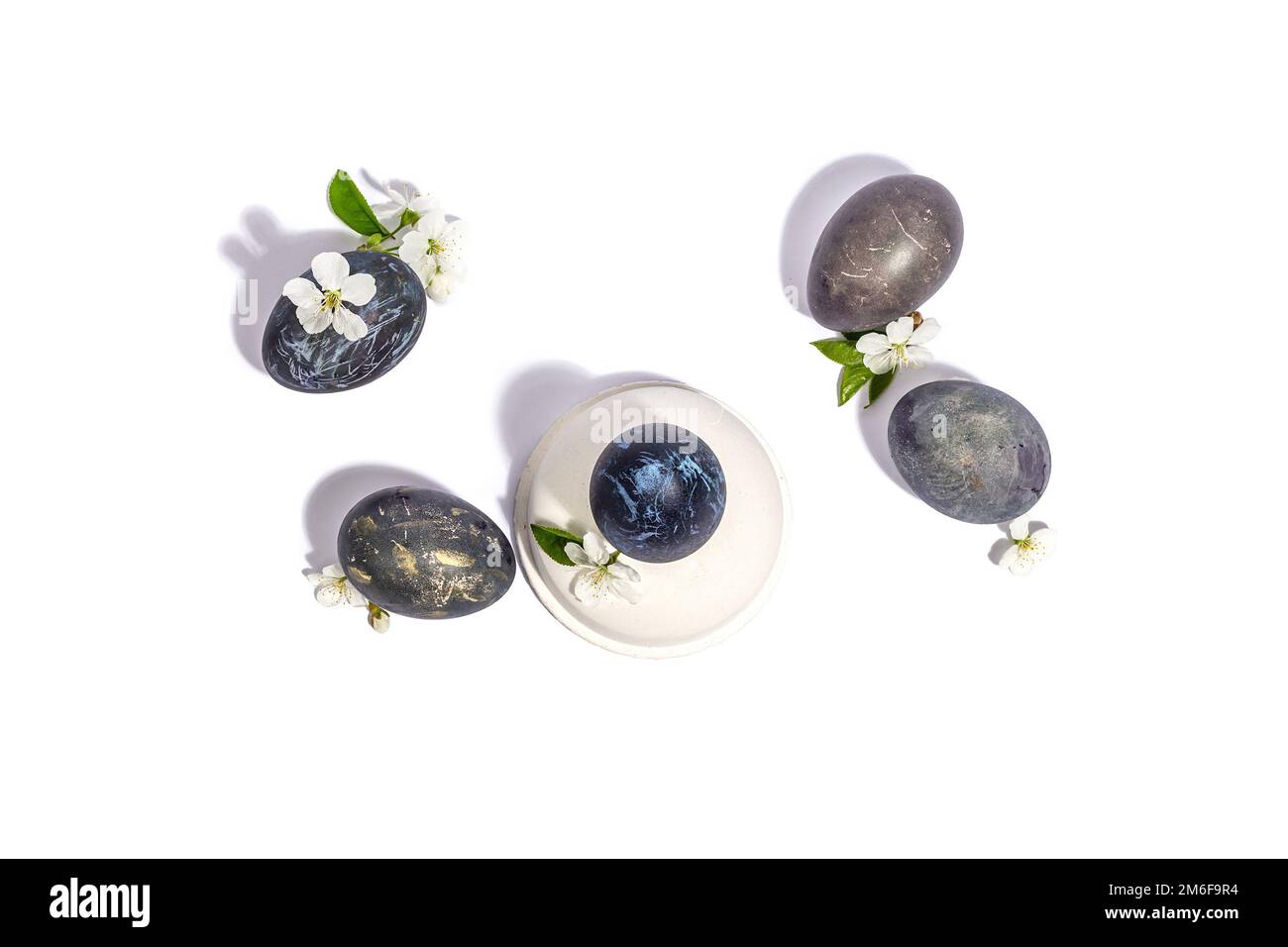 Easter egg on a beton stand isolated on white background. Traditional ...