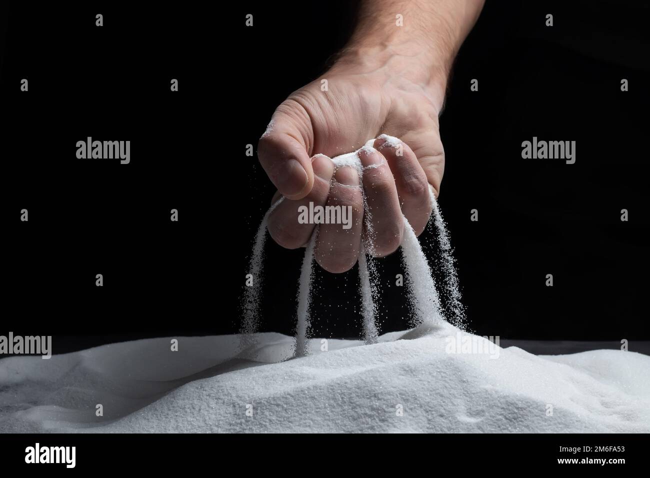 Sifting through the sand on the beach hi-res stock photography and ...