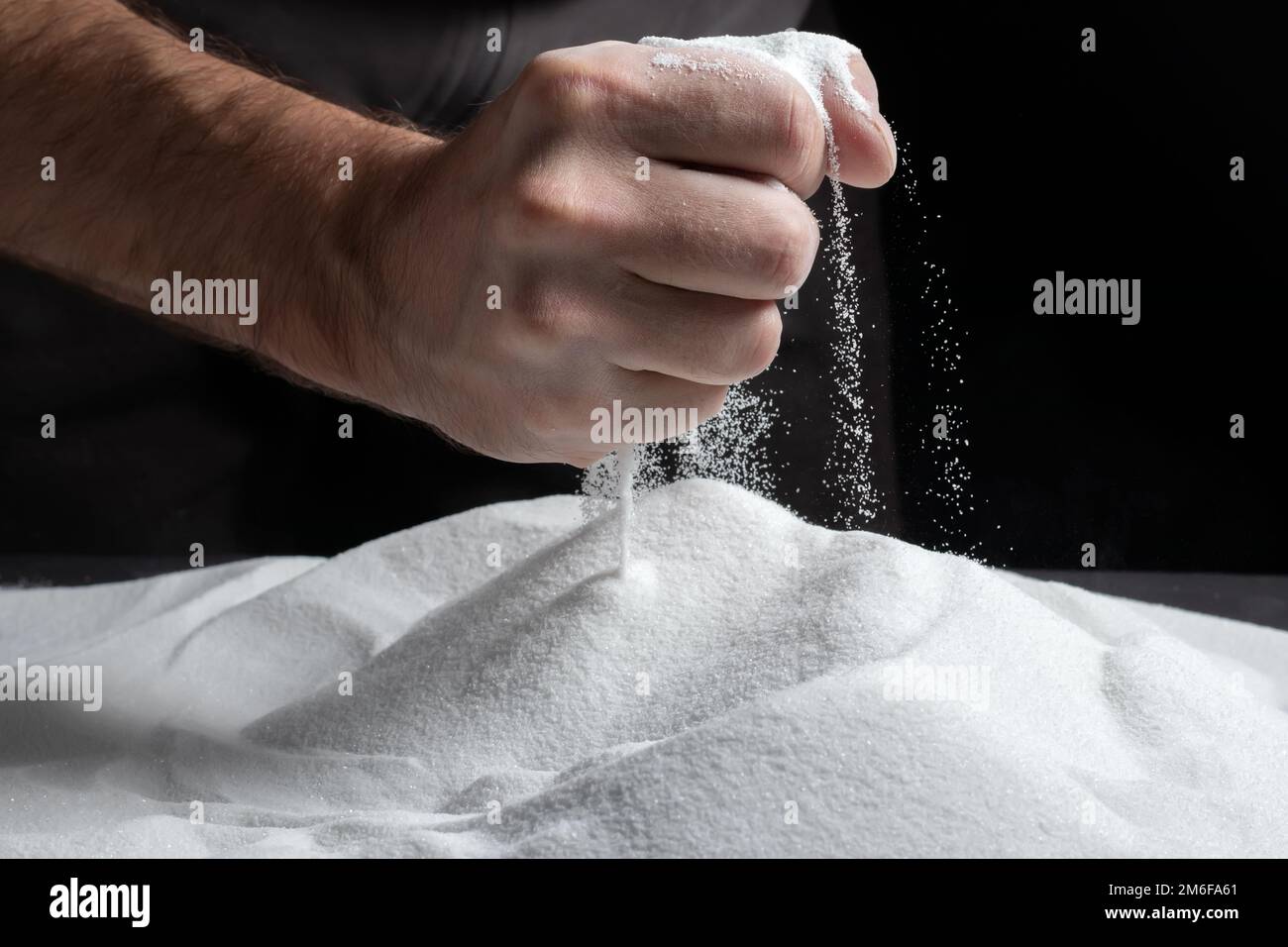 Sifting through the sand on the beach hi-res stock photography and ...